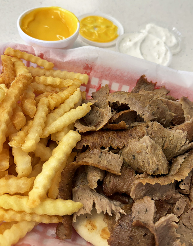 Crinkle-cut fries and thinly-sliced gyro meat: a cross-cultural romance that proves some of the best relationships don't need to make sense on paper.