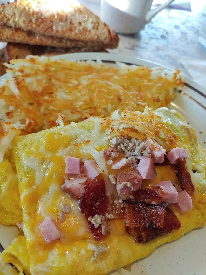 This isn't just an omelet &ndash; it's a protein festival where ham, bacon, and cheese throw the party of the day on your breakfast plate.