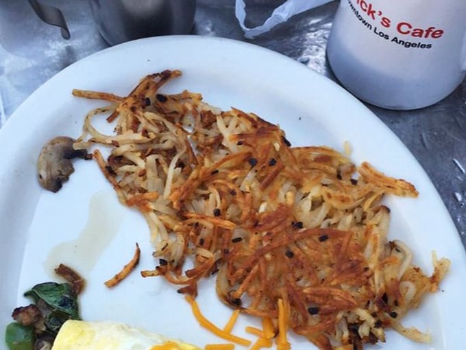 These hash browns achieve the textural paradox only diner masters can perfect: shatteringly crisp exterior giving way to tender potato within.