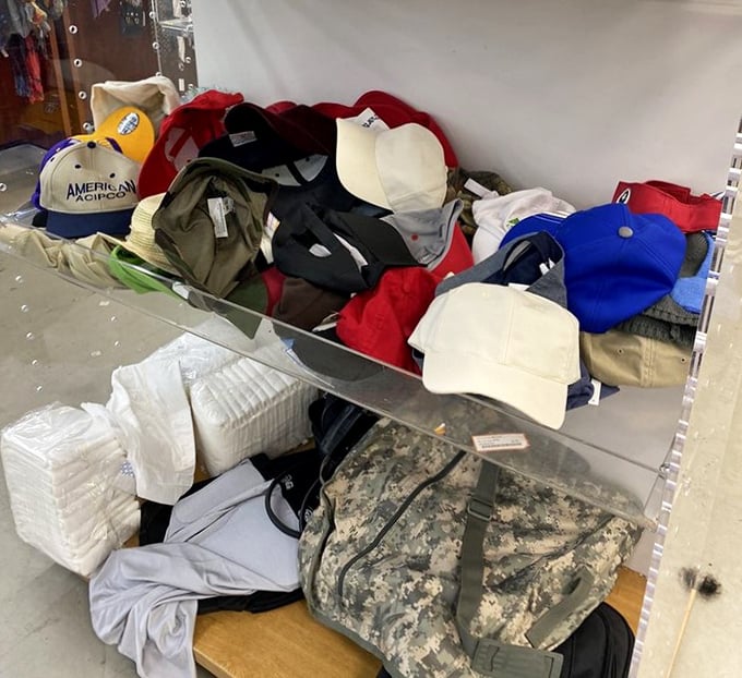 The hat section &ndash; where military caps mingle with baseball classics, creating the perfect opportunity to try on new personalities for less than lunch money.