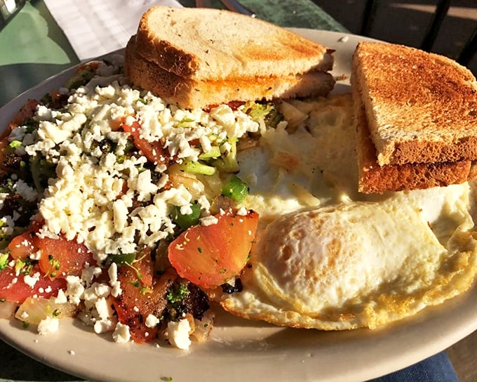 Behold the legendary Hippie Hash&mdash;where crispy potatoes meet colorful veggies under a blanket of feta. It's breakfast nirvana that's equally delicious at 9 AM or 3 AM.