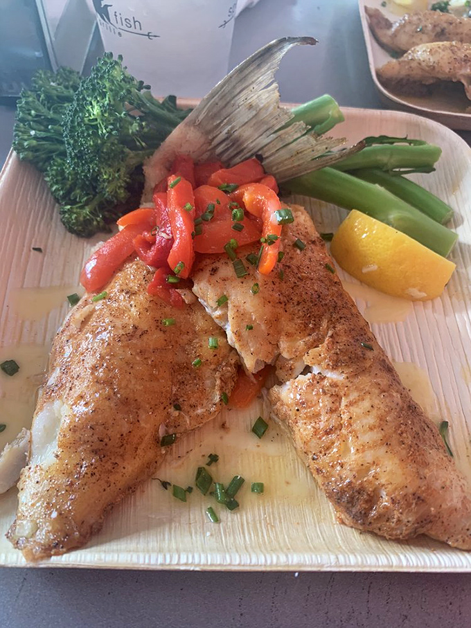 Perfectly seasoned hogfish with roasted peppers and fresh vegetables is what Florida coastal dining dreams are made of.