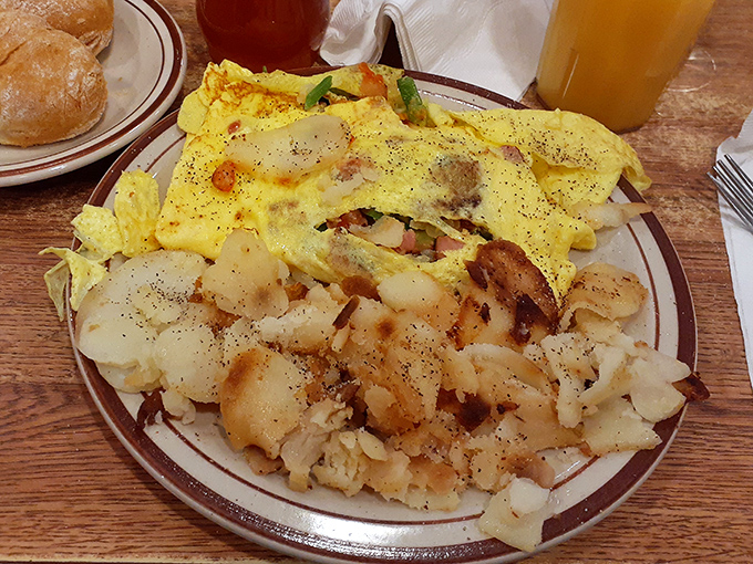 An omelet that's practically a geological expedition&mdash;layers of vegetables and cheese creating a breakfast landscape worth exploring.