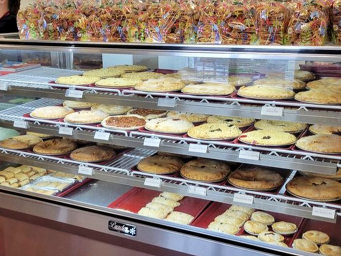 Pie paradise in all its glory. If these shelves could talk, they'd tell tales of customers driving hours just for one perfect slice.