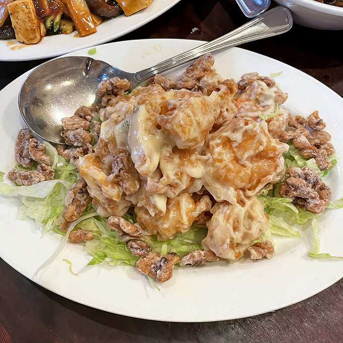 Honey walnut prawns that strike the perfect balance between crispy and creamy – the culinary equivalent of a magic trick.