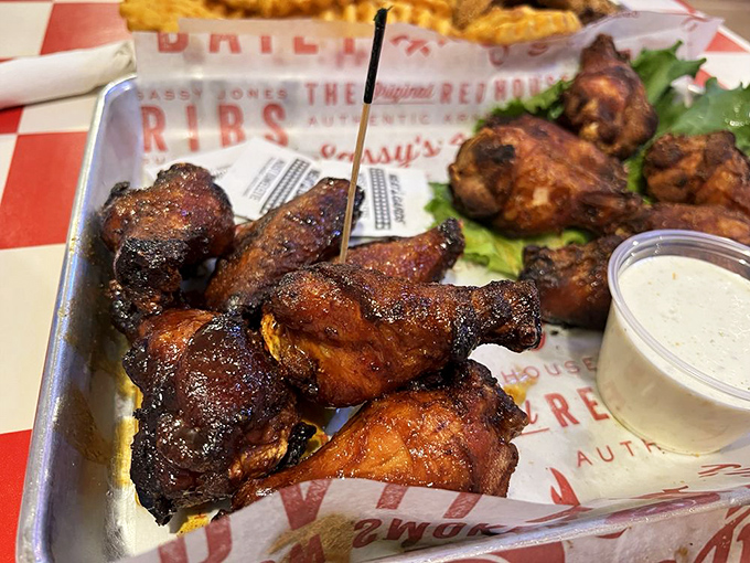 Wings with that perfect smoke ring and glistening exterior—proof that chicken parts can achieve greatness with the right rub and enough patience.