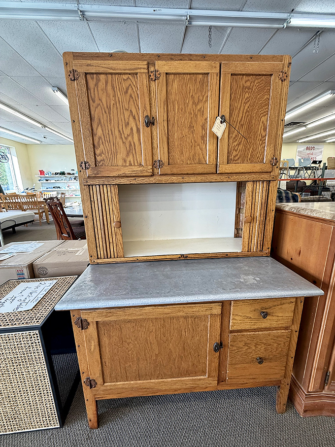 Not just a Hoosier cabinet &ndash; it's a portal to grandma's kitchen, complete with flour-dusted memories and the ghosts of Sunday dinners past.