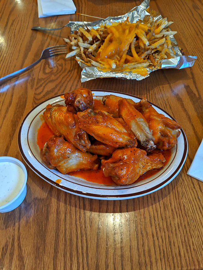Buffalo wings that don't mess around—vibrant, saucy, and unapologetically messy. The kind that make you forget about your white shirt until it's too late.