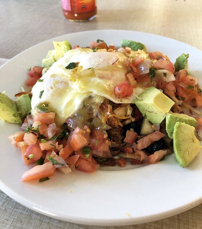 Not your average breakfast&mdash;this colorful fiesta on a plate brings together avocado, salsa, and eggs in perfect harmony.