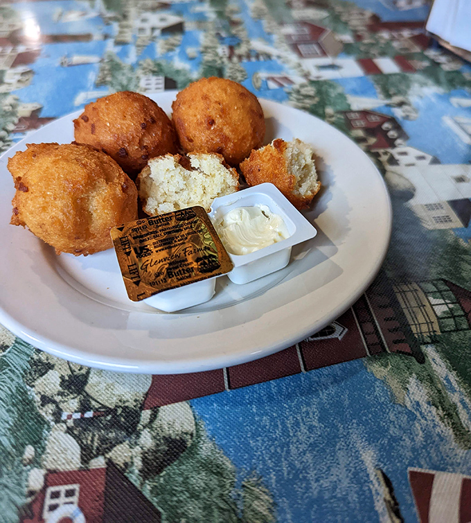Golden-brown hushpuppies that crunch then yield to a tender interior. These aren't just side dishes&mdash;they're little spheres of Southern comfort.