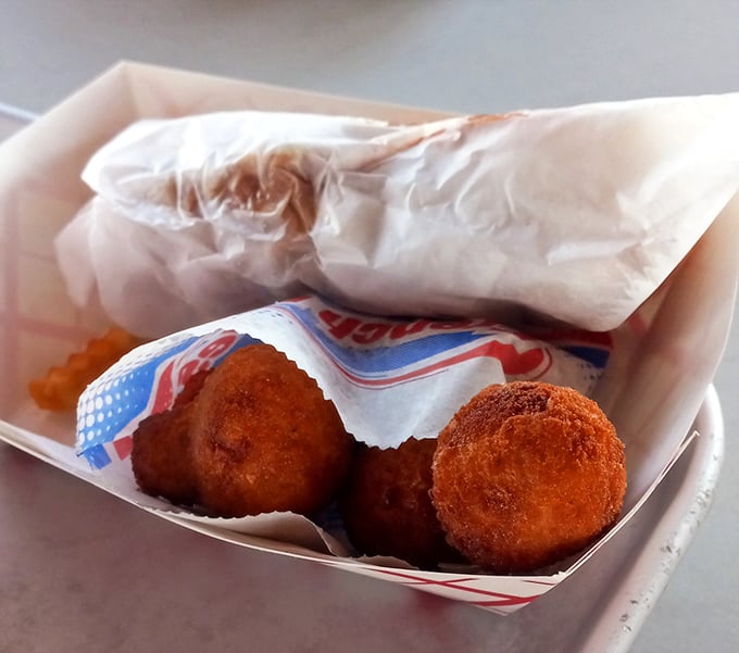 These golden hush puppies aren't just fried dough&mdash;they're little orbs of cornmeal joy that would make your Southern grandmother nod in approval.