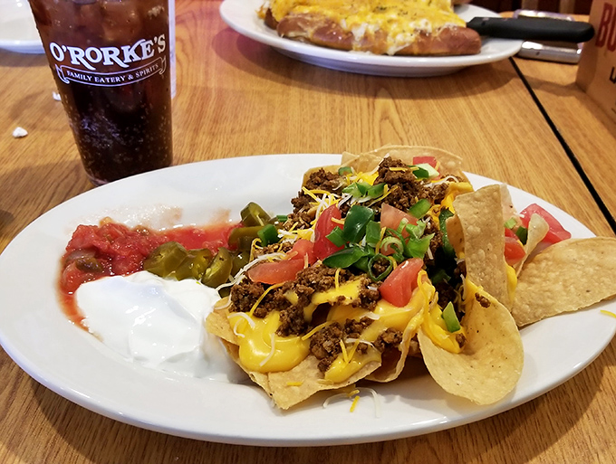 Nachos get the Irish treatment with homemade kettle chips smothered in savory meat, cheese, and fresh toppings &ndash; a cultural mashup that absolutely works.