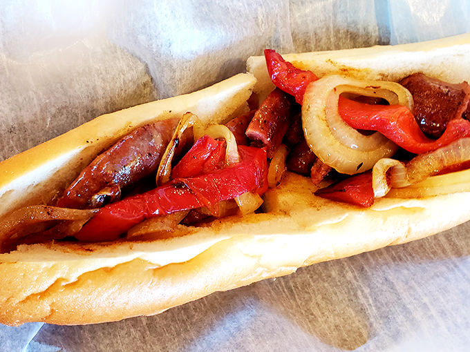 The Italian sausage sub—where sweet peppers and onions find their soulmate in perfectly grilled sausage. Romance on a roll.