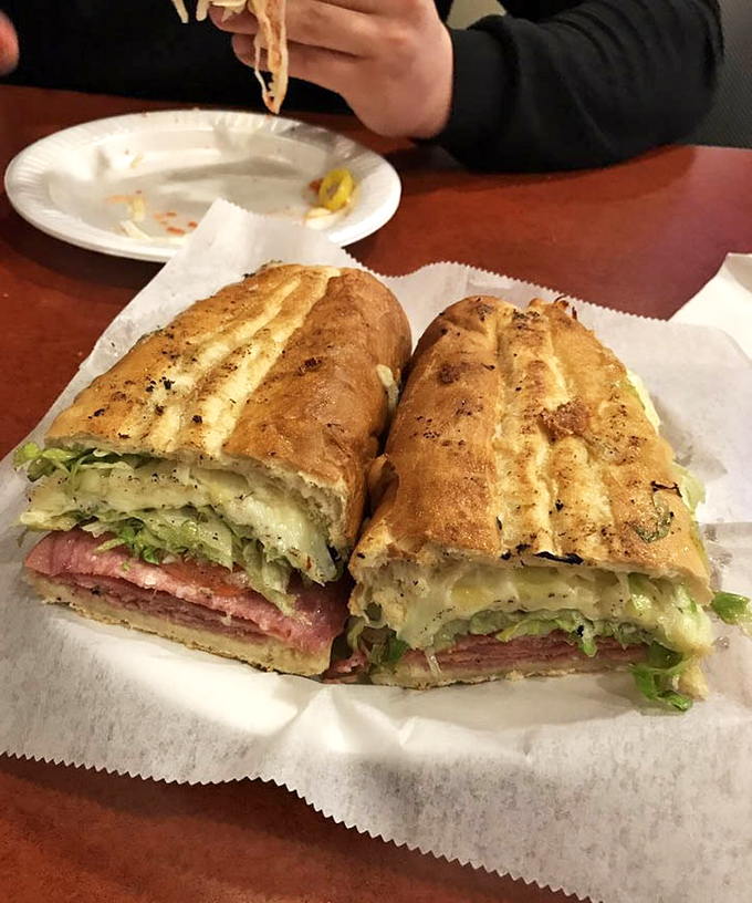 The Italian hoagie stands proud, layers of meat and veggies nestled between bread that's been toasted to that perfect crunch-yet-yield consistency. Sandwich architecture at its finest.