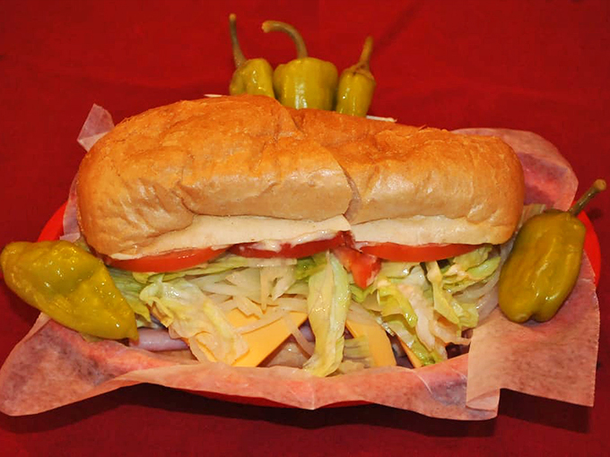 A sandwich that requires both hands and several napkins. The proper Italian sub-to-mouth ratio is measured in delicious mess potential.