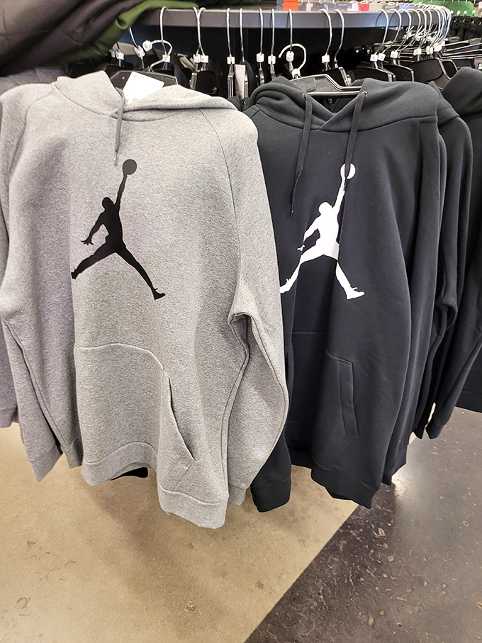 Jordan hoodies hanging like trophies &ndash; comfort meets street cred in gray and black. Athleisure at its finest.