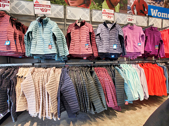 A rainbow of puffer jackets stands ready for South Carolina's three days of actual winter. Nothing says "optimistic shopper" like buying outerwear in a state where "cold snap" means below 60 degrees.