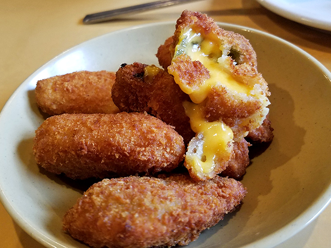 These aren't just jalape&ntilde;o poppers&mdash;they're little golden treasure chests with molten cheese hearts waiting to be discovered.