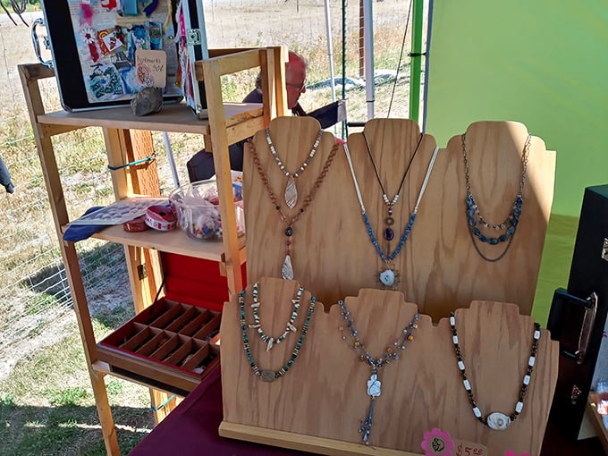 Vendors create miniature retail universes under colorful canopies, where fishing lures might share space with vintage salt shakers. 