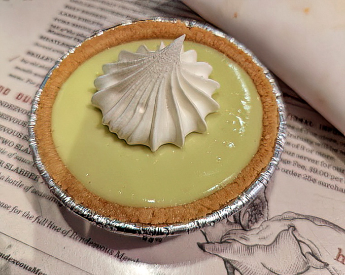 Key lime pie with a meringue crown fit for royalty. The tart, sweet finale that somehow finds room even after a full rack of ribs.