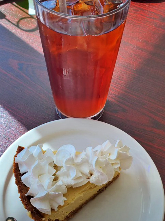 Key lime pie that strikes the perfect balance between tart and sweet, topped with clouds of whipped cream and paired with iced tea – a Florida afternoon in edible form.