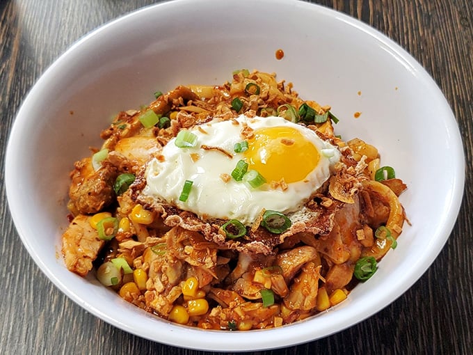 Spicy, savory, and crowned with a perfect egg&mdash;this bowl is what happens when kimchi meets comfort food. The vibrant colors promise a flavor explosion.