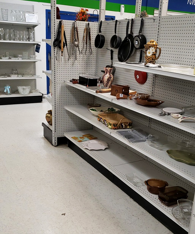 Cast iron pans hanging like medals of culinary honor. These kitchen veterans have stories to tell and meals yet to make.