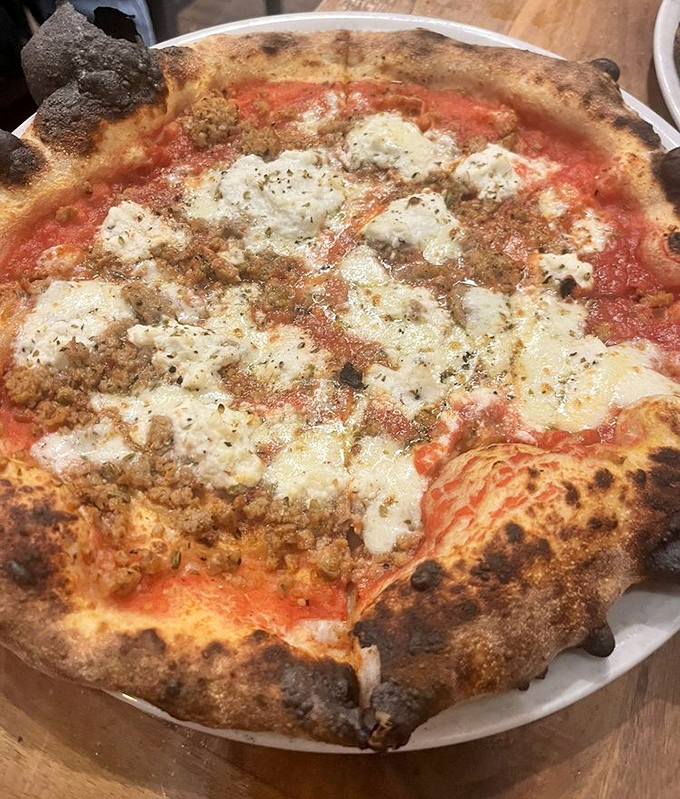 Behold the lasagna pizza that doesn't just have cheese on top&mdash;it has attitude. Those char marks aren't accidents; they're flavor badges of honor.