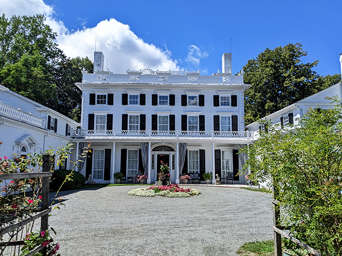 Linden Place's stately white fa&ccedil;ade and manicured grounds whisper stories of Bristol's past, inviting visitors to step back into a more elegant era.