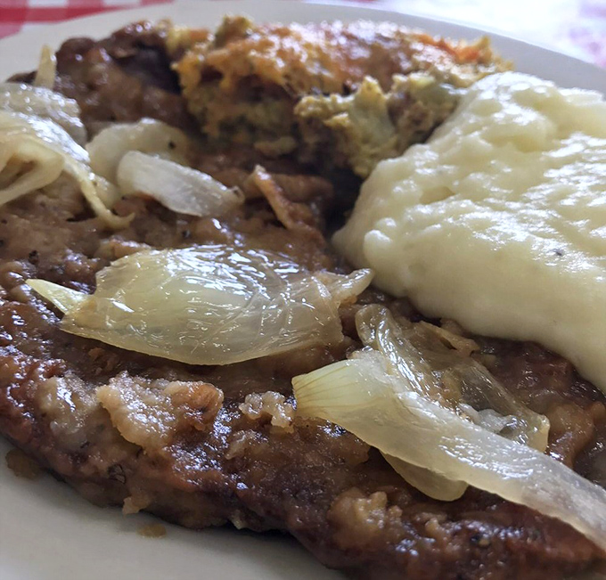 Liver and onions—the dish that separates the culinary adventurers from the tourists. Tender, savory, and unapologetically old-school.