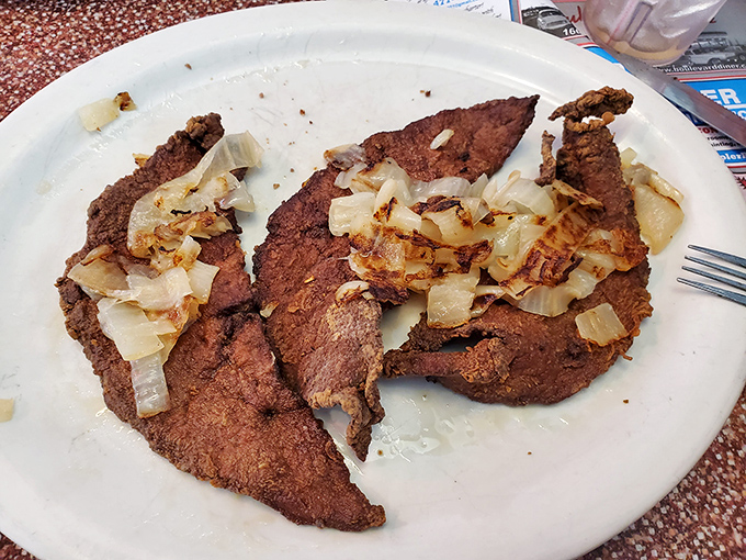 Liver and onions&mdash;that divisive diner classic that separates the culinary adventurers from the cautious&mdash;served with a side of nostalgia and caramelized sweetness.