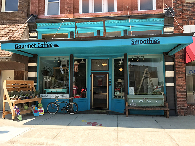 That turquoise storefront isn't just eye-catching; it's a beacon of caffeine civilization in the prairie, promising conversation with every cup.
