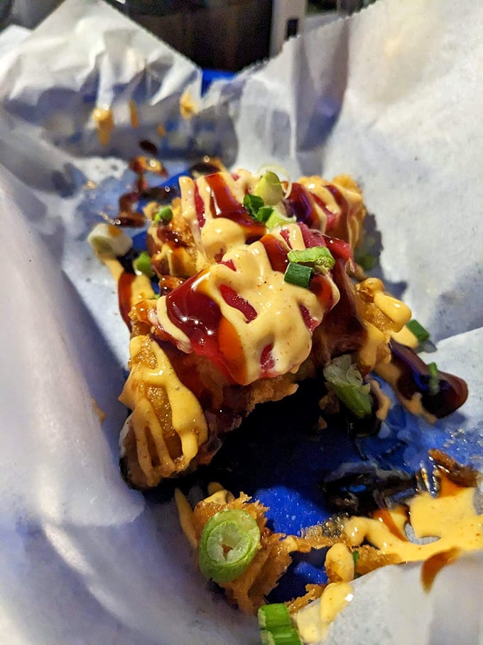 Loaded Crab Fries: Where the humble potato gets dressed up for a night out with crab dip, bacon, and enough cheese to make Wisconsin jealous.