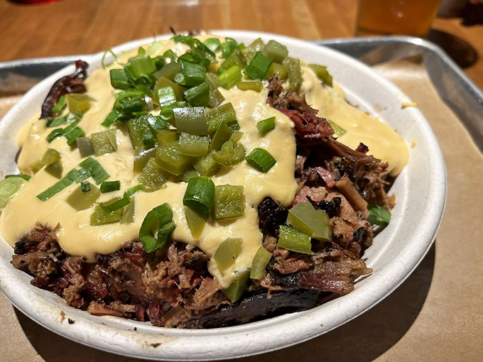 When loaded potatoes meet smoked meat, angels sing and your diet plans quietly pack their bags and leave town.