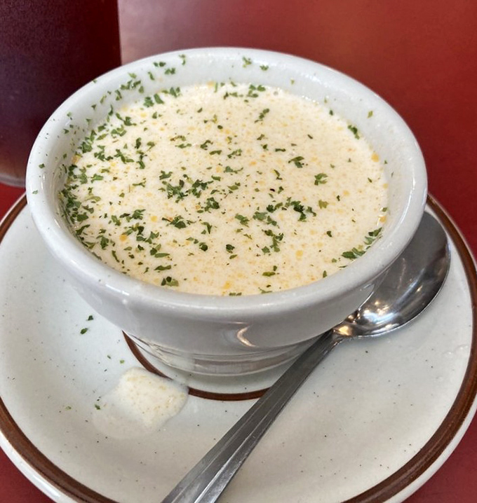 This isn't just soup; it's a creamy ocean symphony in a bowl, topped with fresh herbs that add the perfect high note.