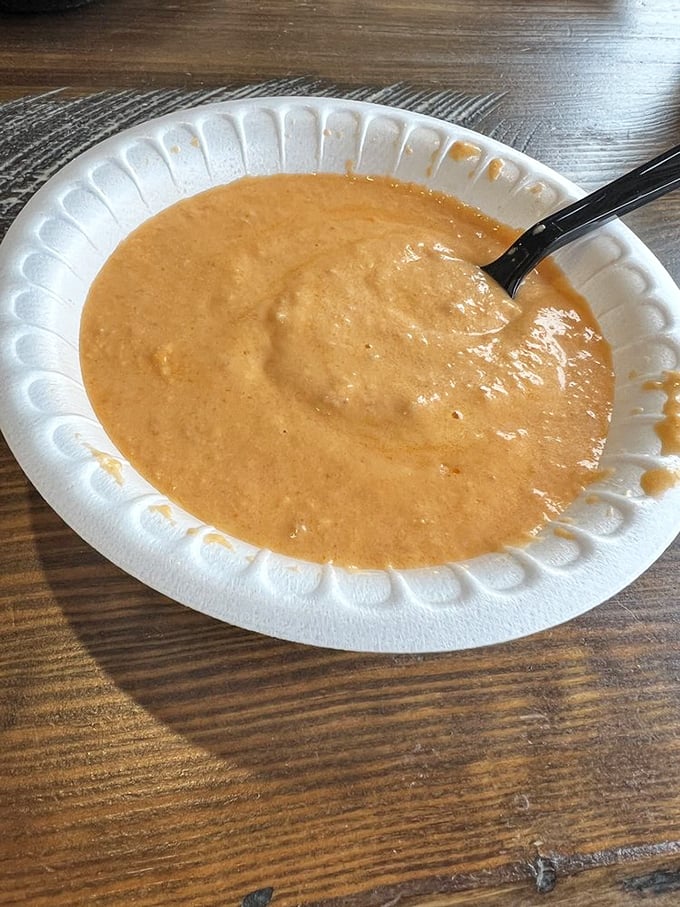 A velvety orange sea of lobster bisque awaits your spoon&mdash;rich, creamy, and carrying whispers of the ocean in every steaming spoonful.
