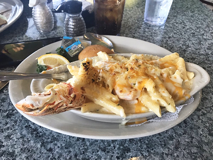 Lobster mac and cheese: where comfort food puts on its fancy pants and still manages to give you a warm, cheesy hug.