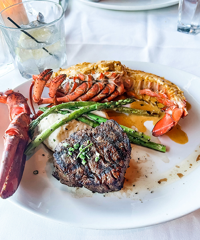 Surf and turf nirvana: where lobster tail and filet mignon share a plate in perfect harmony, like Sinatra and Bennett in culinary form.