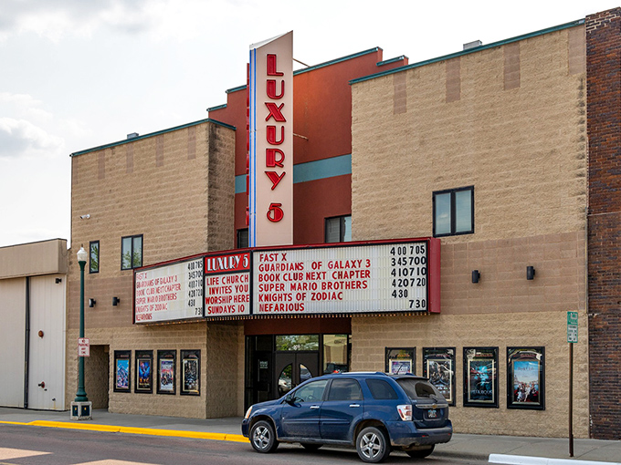 The Luxury 5 Theater's vintage marquee announces movies the old-fashioned way &ndash; no streaming password required, thank goodness.