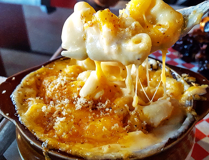 Mac and cheese that stretches like a cheesy suspension bridge between your spoon and bowl&mdash;comfort food engineering at its finest.