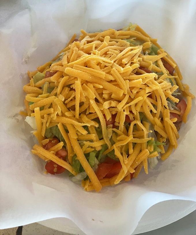 A salad that Texas interpreted as "put some lettuce under all that cheese and call it balanced." Brilliant strategy.