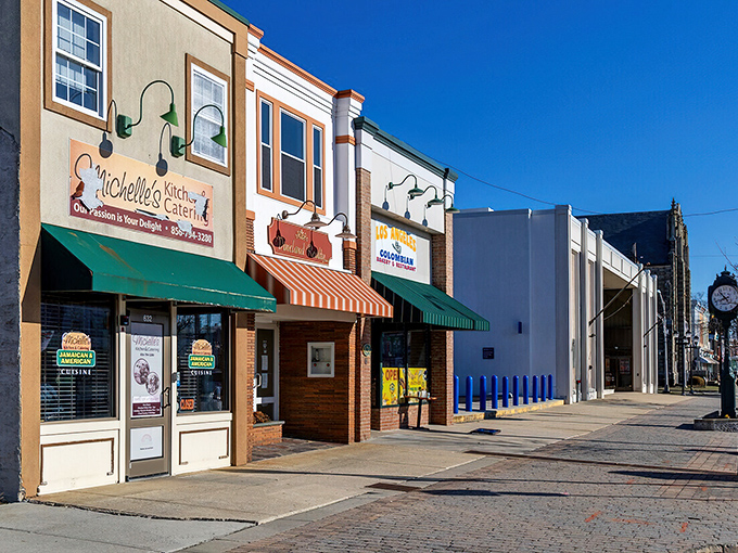 Main Street's colorful awnings and brick sidewalks create that increasingly rare shopping experience where you actually want to linger rather than click "add to cart."