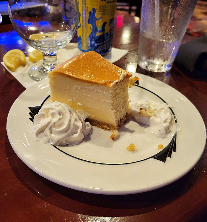 After the meat sweats subside, this cheesecake awaits—a creamy finale that somehow finds room in even the fullest of bellies.
