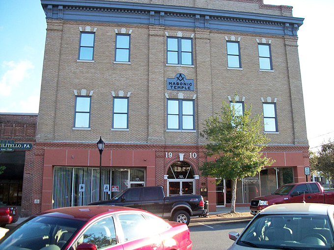 The Masonic Temple stands as a brick testament to secret handshakes and community service, with just enough mystery to fuel local legends.