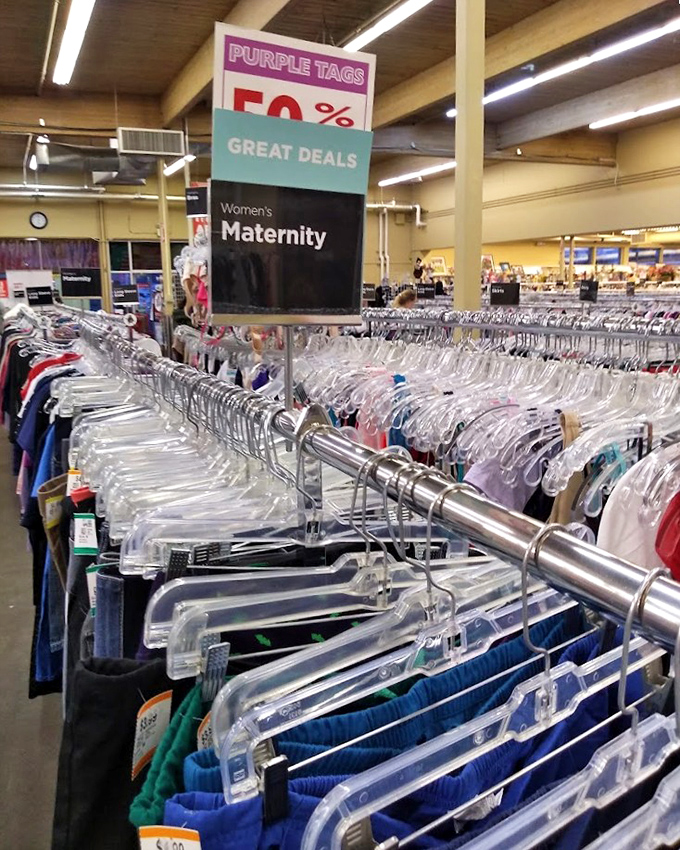 The maternity section's purple tags announce 50% off, proving that even in Alaska, the circle of life comes with a discount.