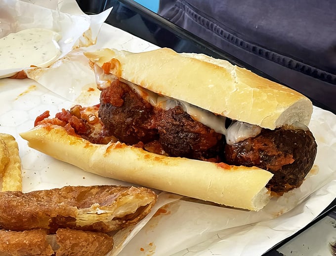 The meatball sub looks like it could bench press your appetite. Those sauce-drenched spheres of joy nestled in French bread are calling your name.