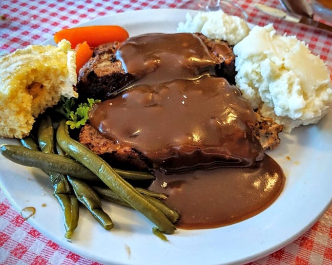 Meatloaf smothered in gravy that would make your grandmother both proud and jealous. Those green beans aren't just along for the ride.