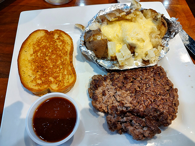 The ultimate comfort plate &ndash; a hearty meatloaf with loaded potato that whispers, "Diet? What diet? We're having a moment here."
