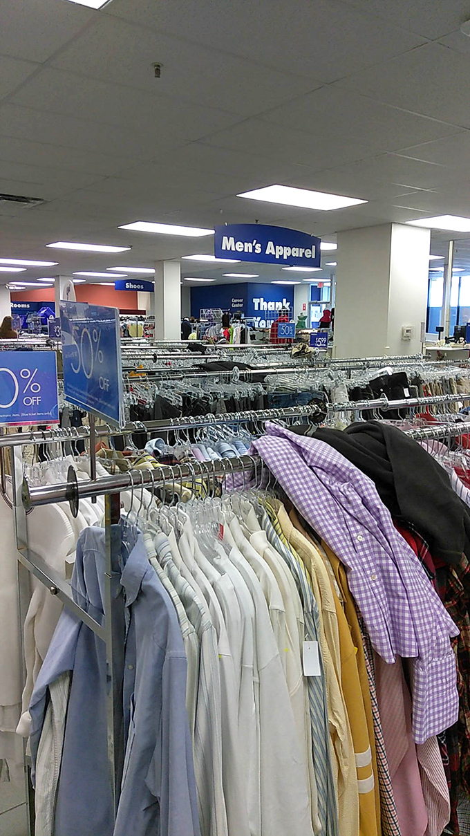 Under the "Men's Apparel" sign, Brooks Brothers shirts that once clothed Wall Street warriors now hang ready for new adventures.