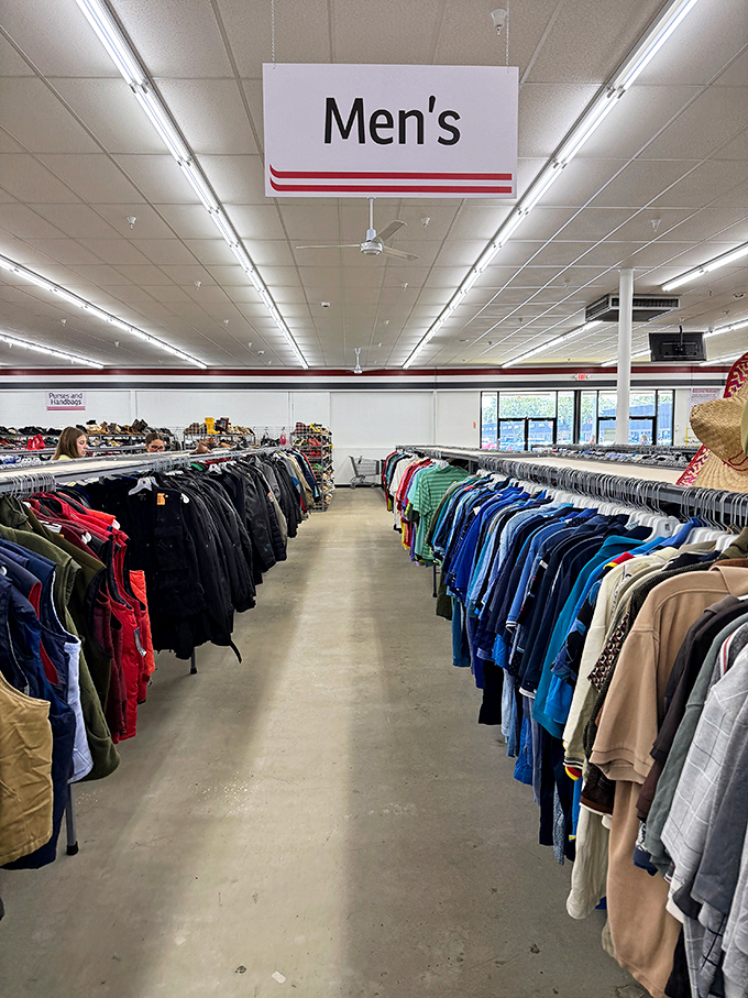 The men's department stretches into the distance like a color-coded roadmap to style reinvention, no mortgage required.